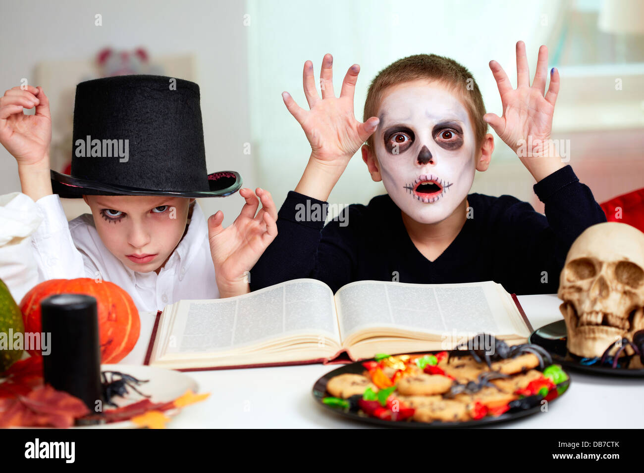Photo of twin eerie boys looking at camera with frightening look Stock ...