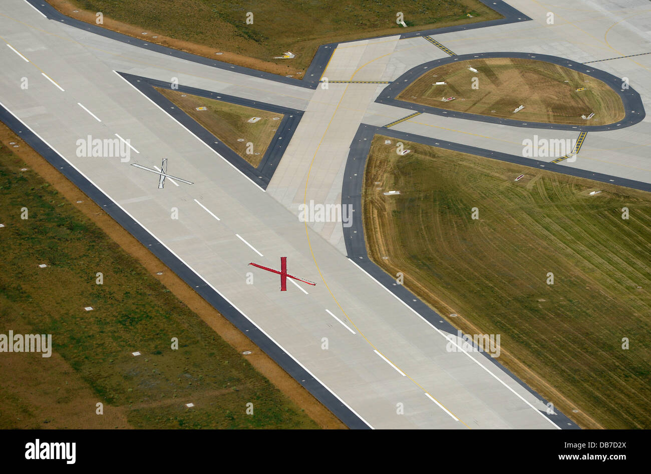 Aerial view of the runway marked with a red cross at the Berlin airport BER in Schoenefeld ...