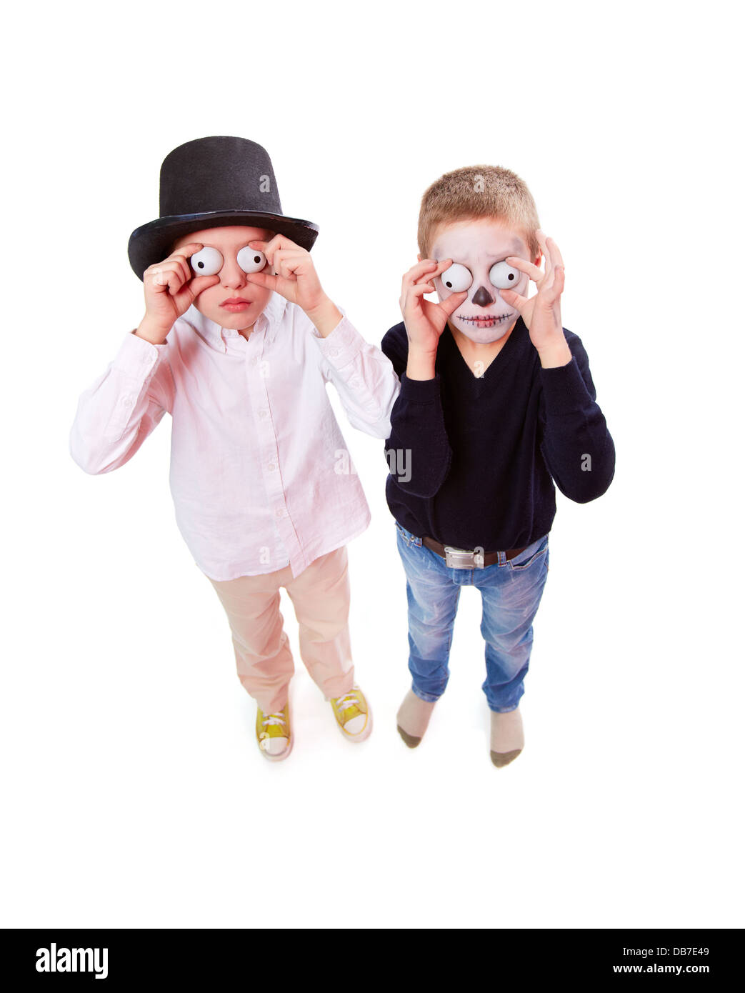 Photo of two eerie boys frightening people on Halloween Stock Photo - Alamy