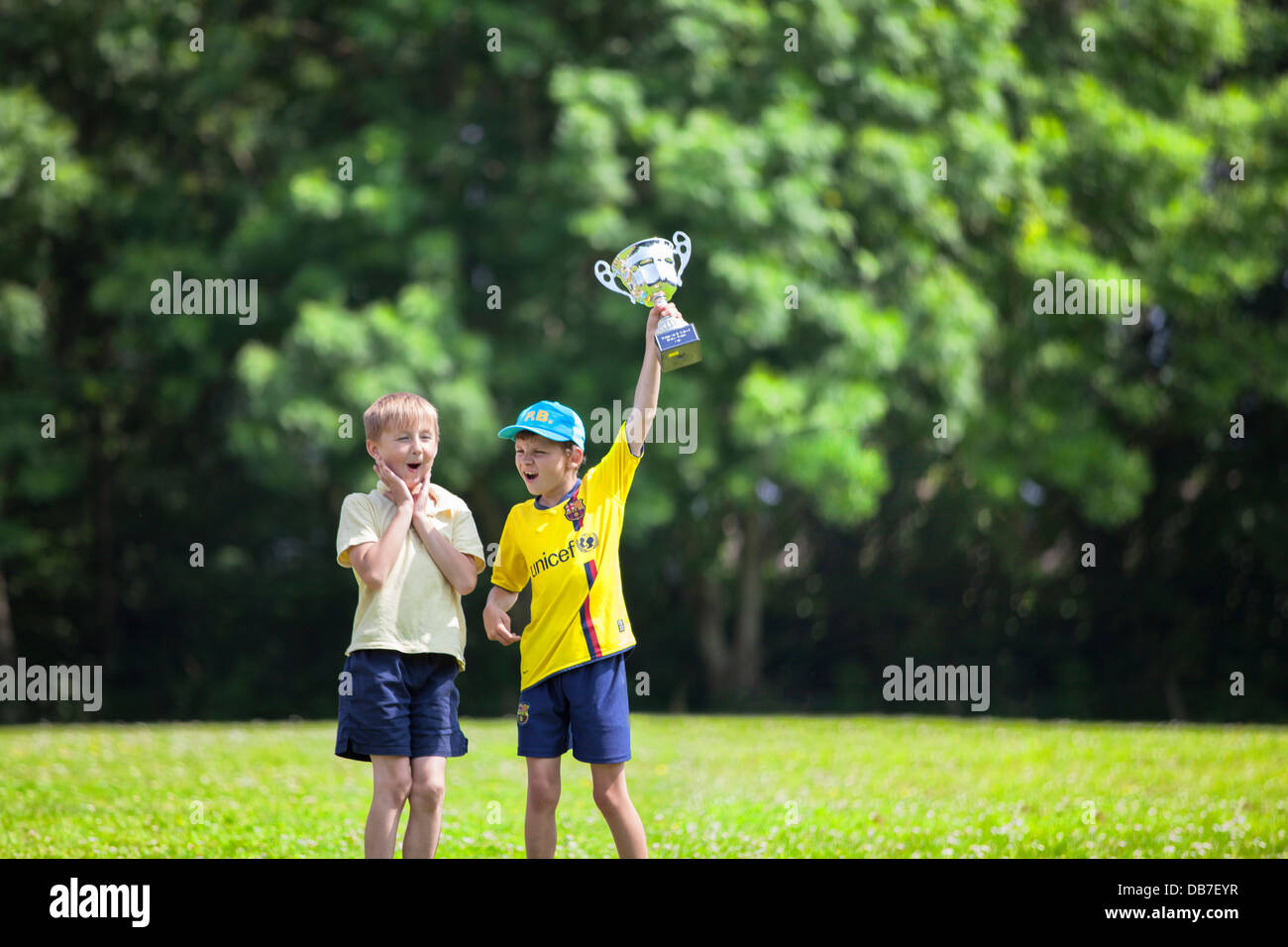 Boy trophy hi-res stock photography and images - Alamy