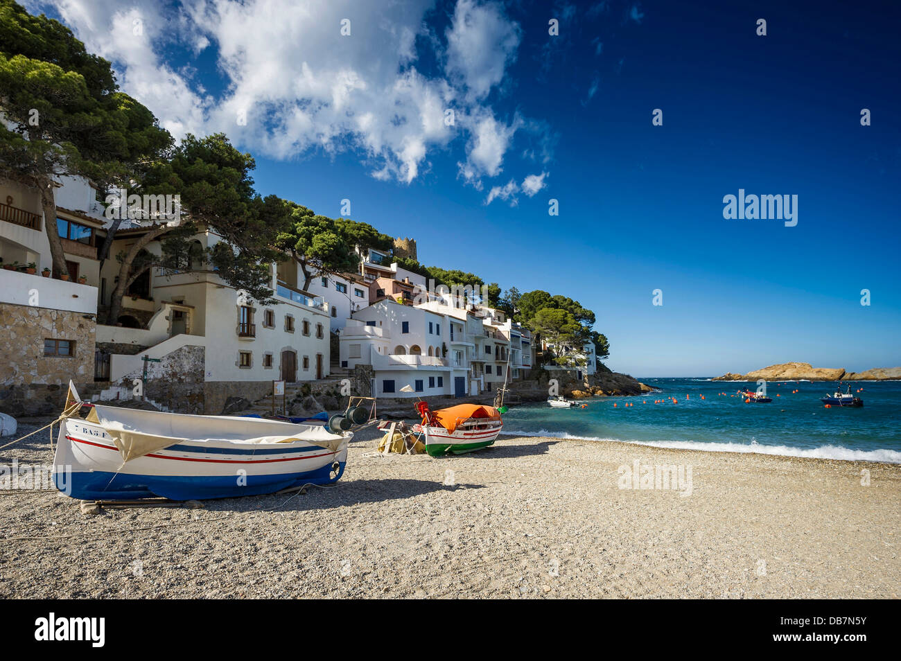 Village with beach and fishing boats on the sea Stock Photo - Alamy