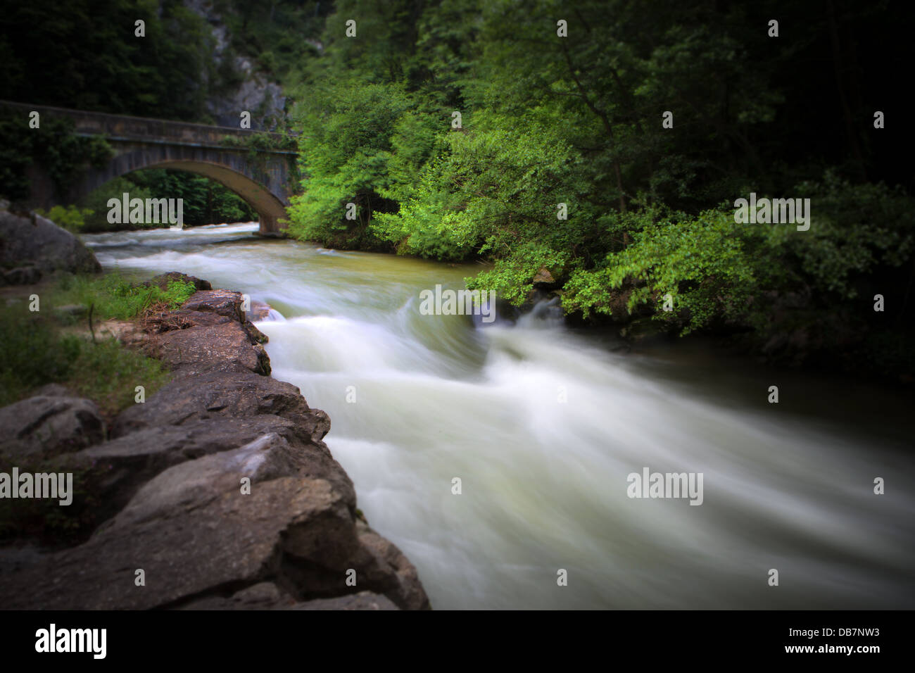 Bridge fast flowing river hi-res stock photography and images - Alamy