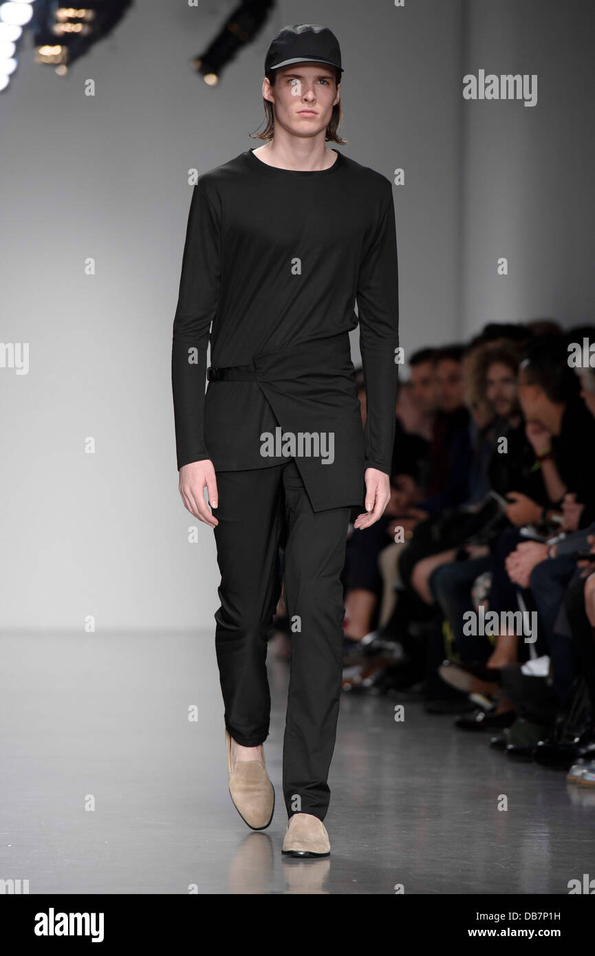 Models wear a design from the Lee Roach collection during London ...