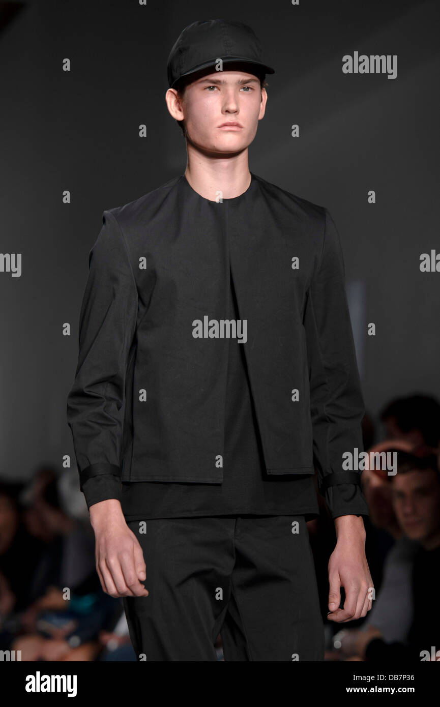 Models wear a design from the Lee Roach collection during London ...