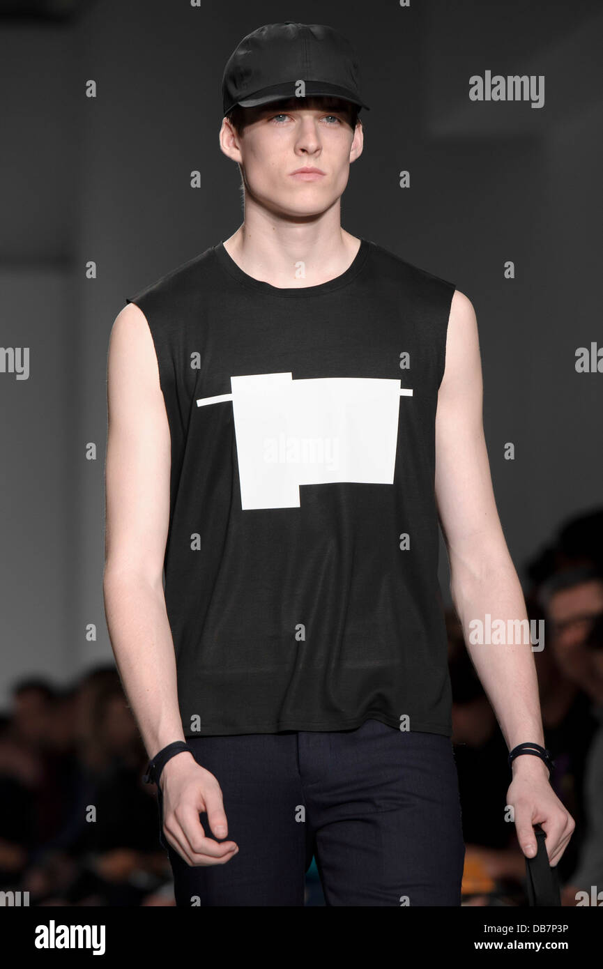 Models wear a design from the Lee Roach collection during London ...
