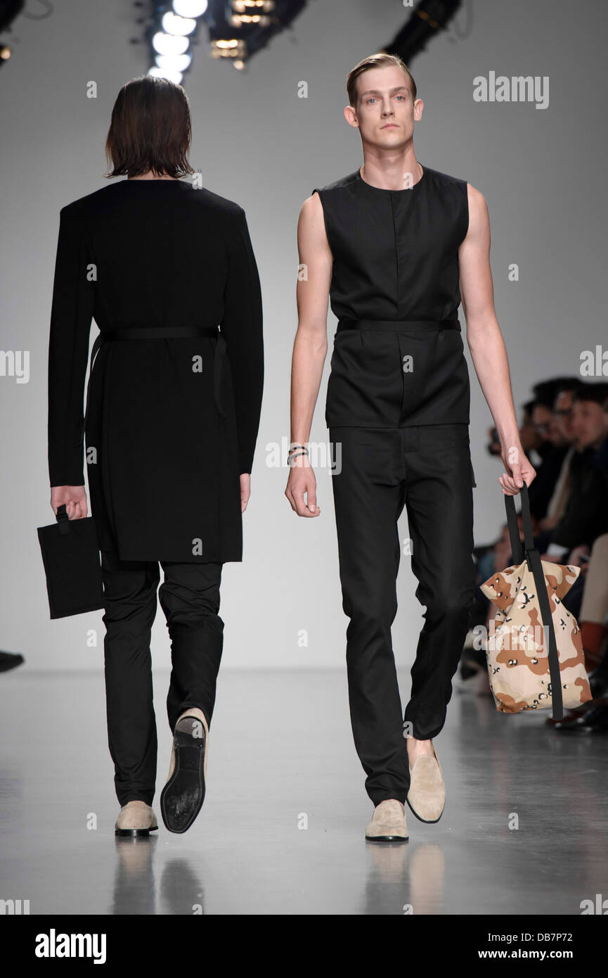 Models wear a design from the Lee Roach collection during London ...