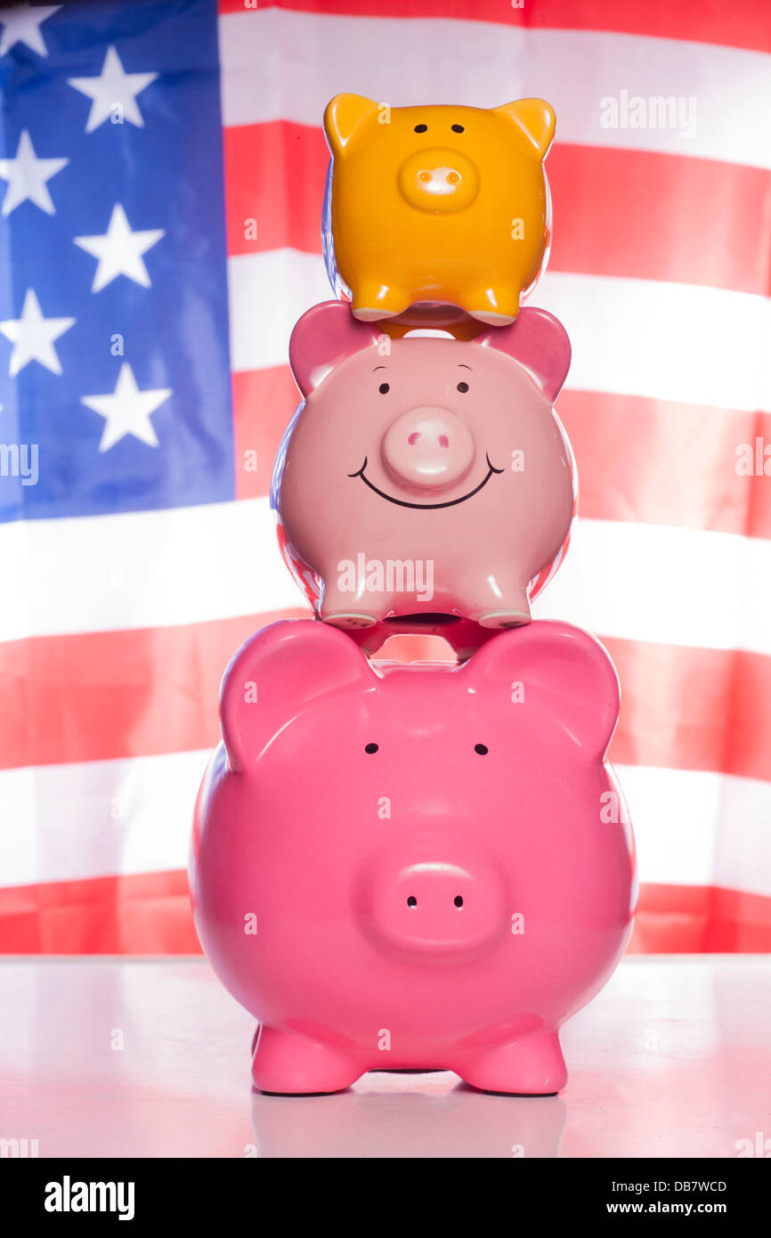 piggy banks on an American flag Stock Photo - Alamy