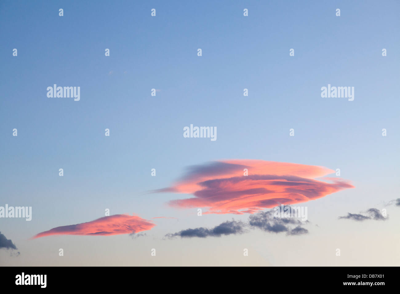 Evening pink clouds in blue sky Stock Photo - Alamy