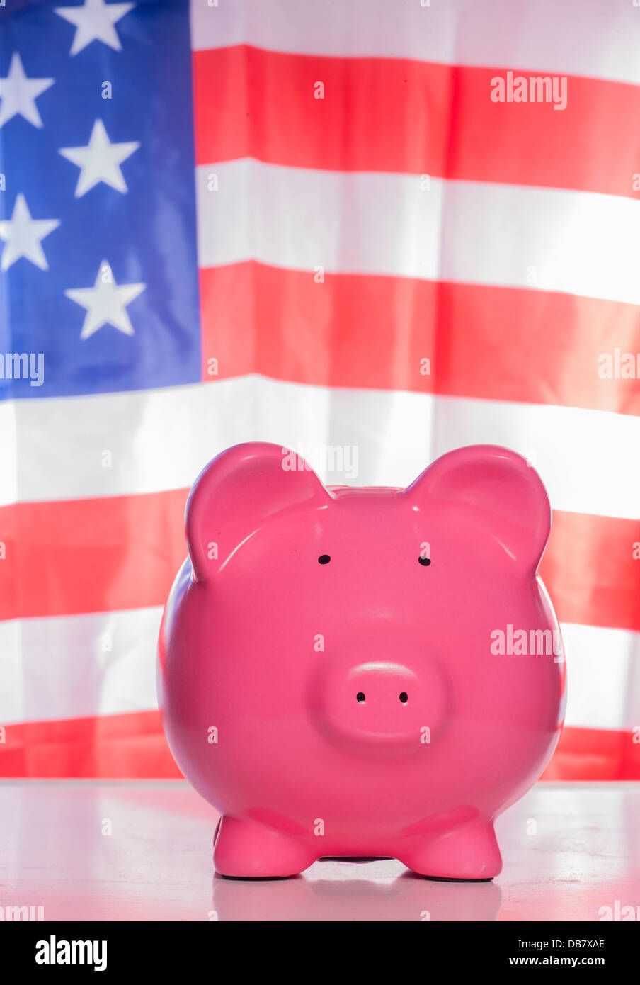 piggy bank on an American flag Stock Photo - Alamy