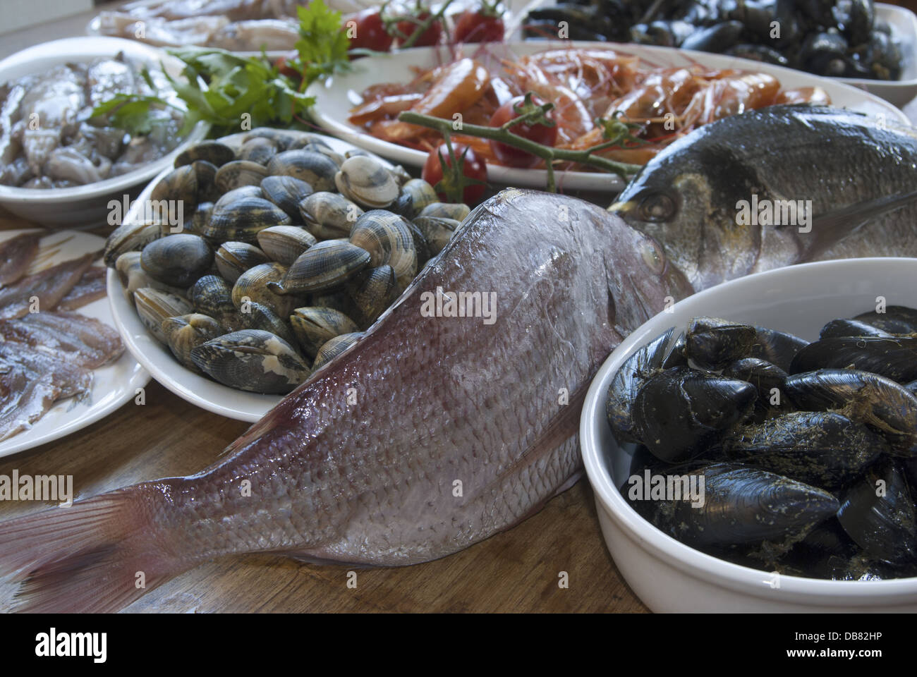 fresh bluefish: healthy raw fish mixed Stock Photo - Alamy