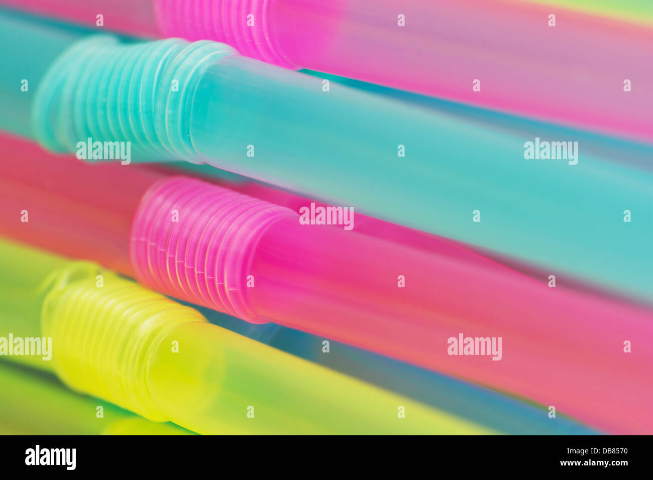 Stack of plastic colored drinking straws Stock Photo - Alamy