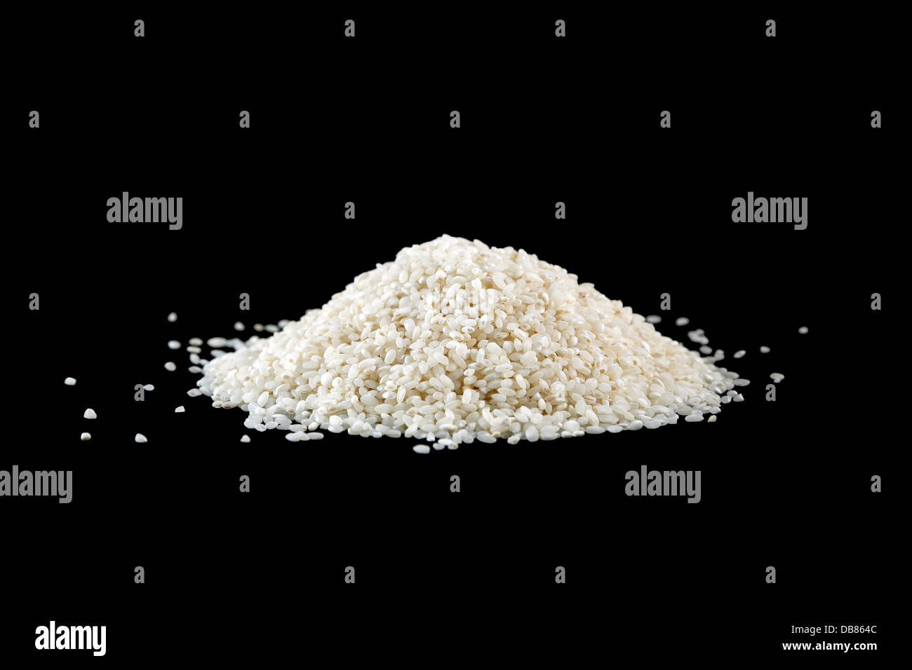 Rice on black background Stock Photo - Alamy