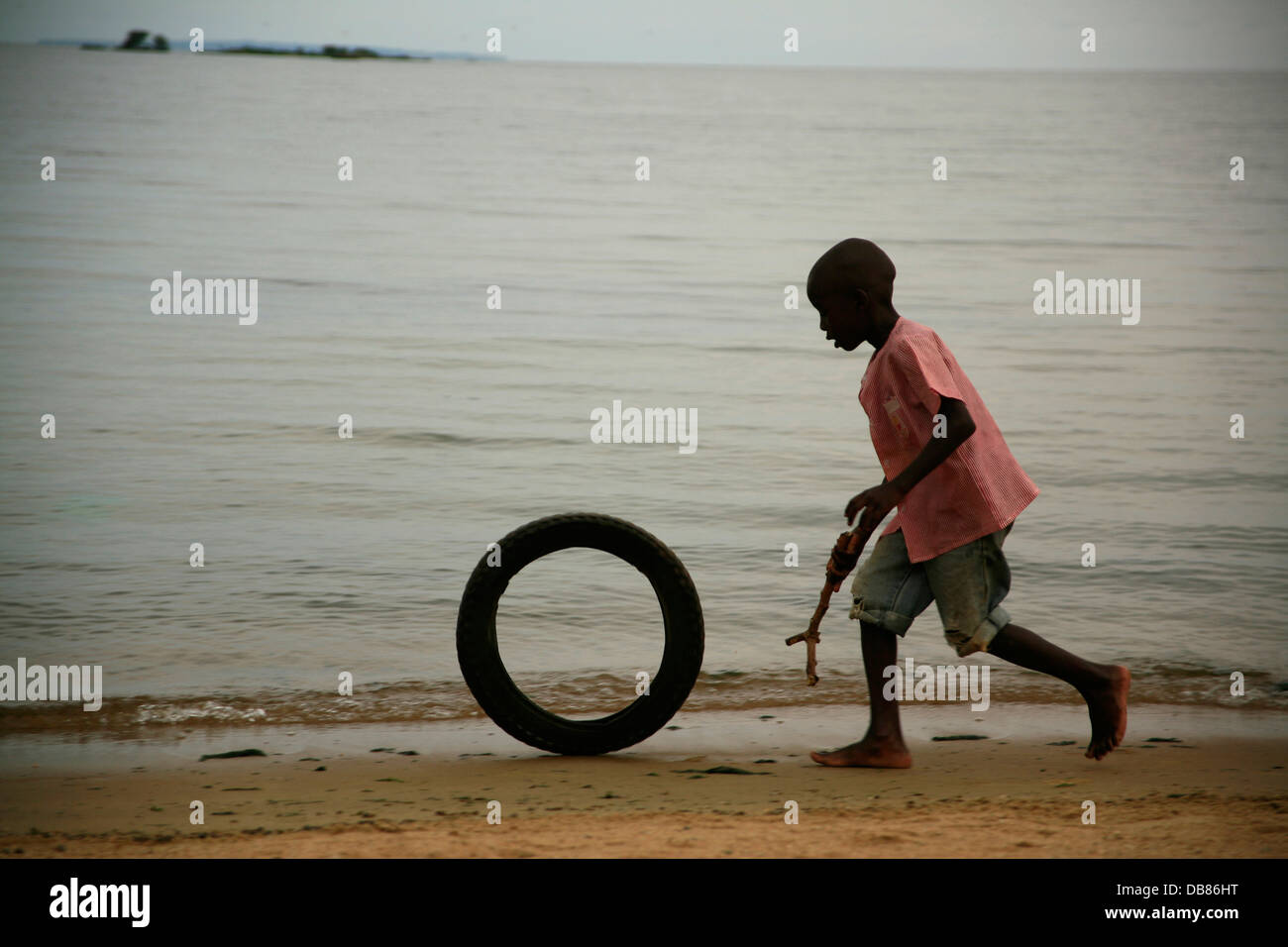Boy on a tyre hi-res stock photography and images - Alamy
