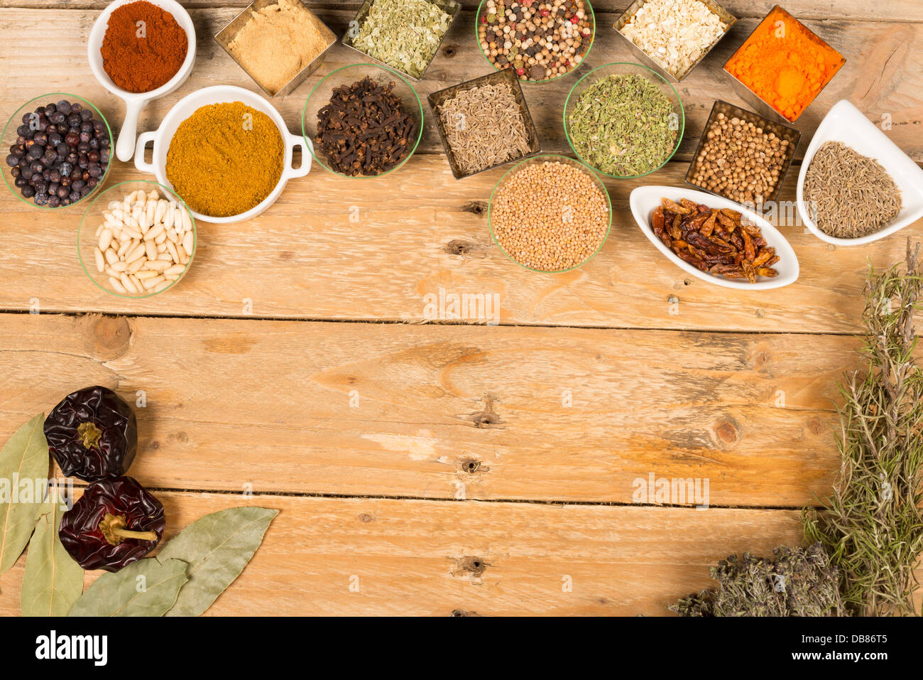 Condiments background set on an old wooden table Stock Photo - Alamy