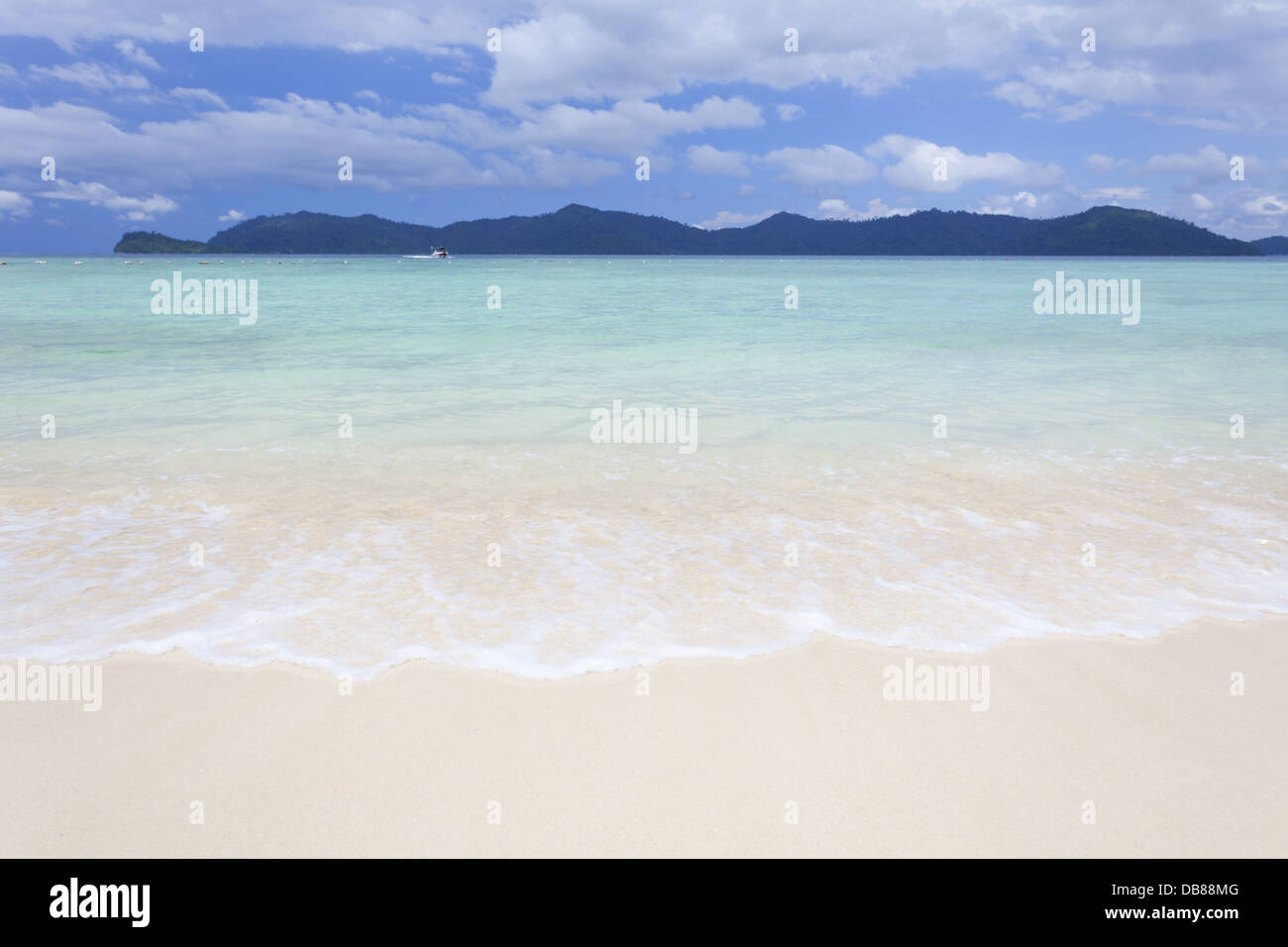Beautiful sandy beach on a tropical island off of the coast of Sabah ...