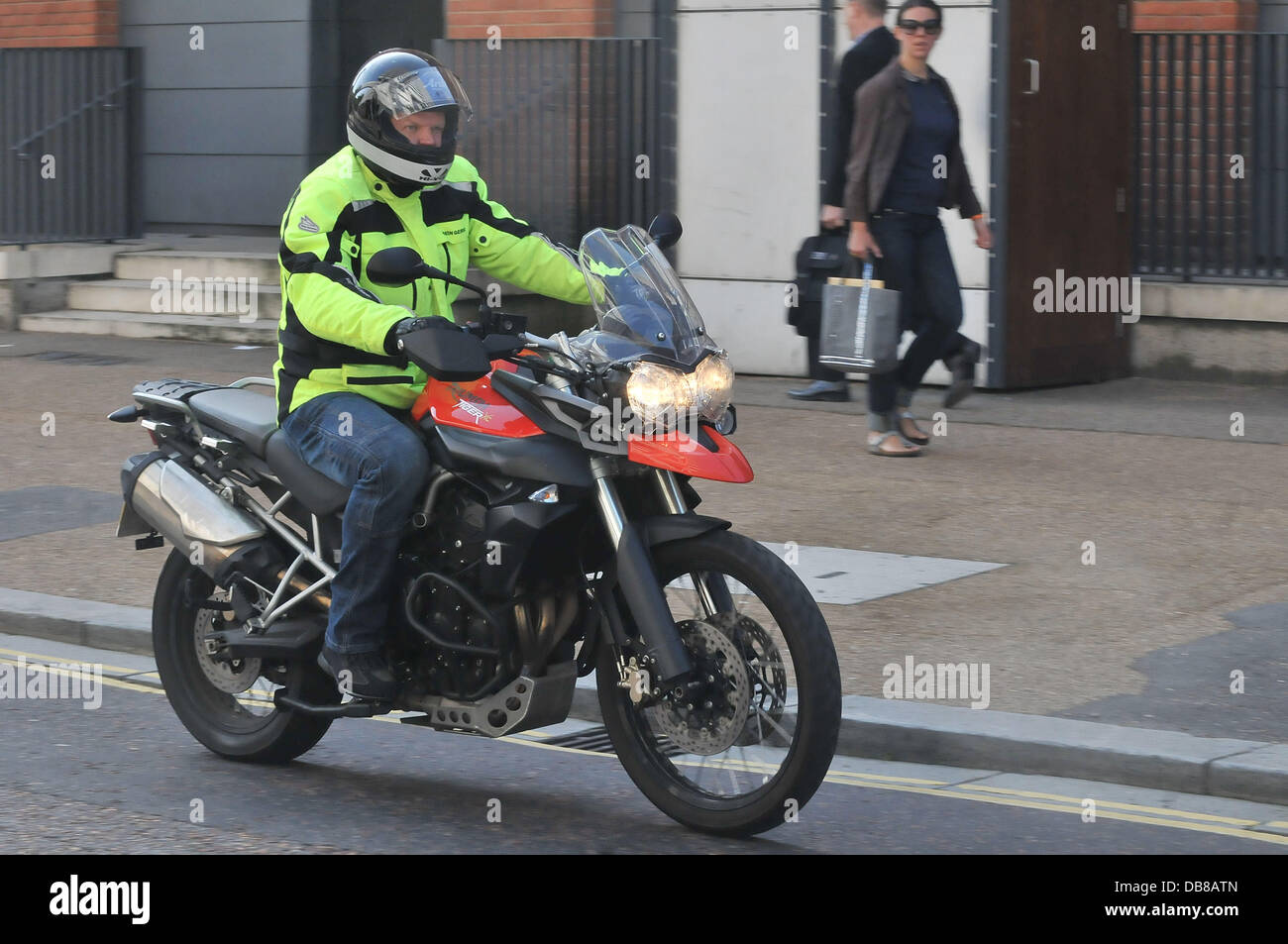 Adrian Chiles leaving the ITV studios on his motorbike London, England ...