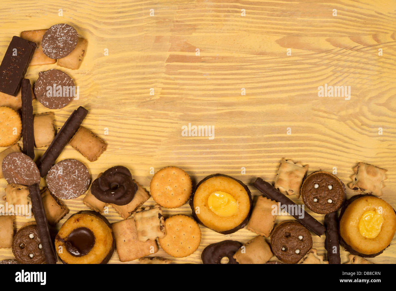 Assorted cookies set up on a wooden table Stock Photo - Alamy