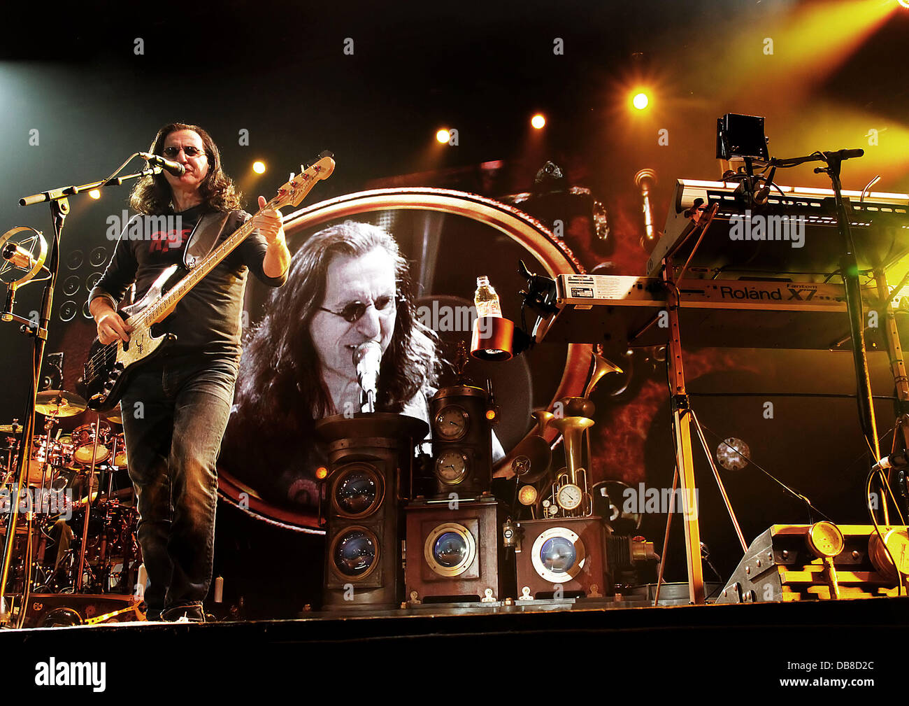 Geddy Lee of Rush performing on stage their 'Bring Their Time Machine ...