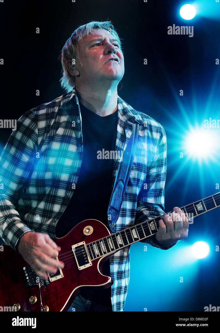 Alex Lifeson of Rush performing on stage their 'Bring Their Time ...
