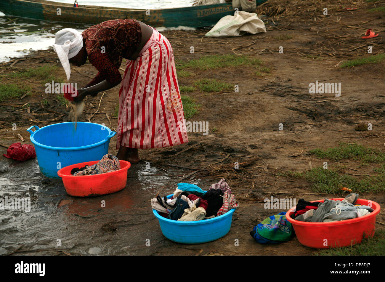 African woman washing clothes in Uganda Stock Photo - Alamy