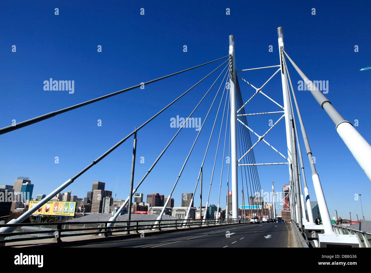 Nelson Mandela Bridge in downtown Johannesburg with skyline in ...
