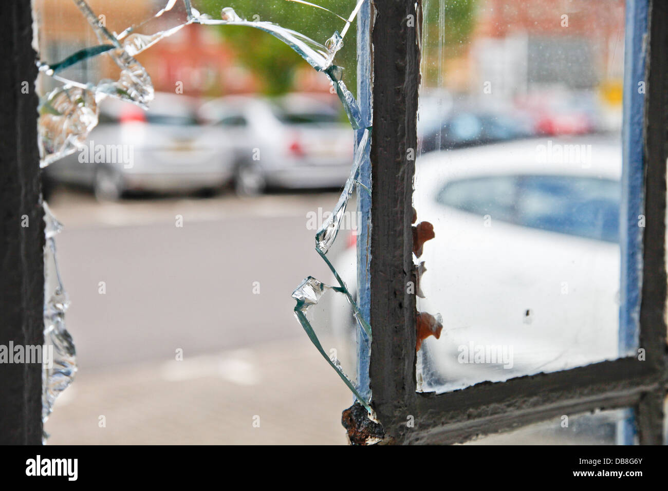 A broken window following a burglary Stock Photo - Alamy