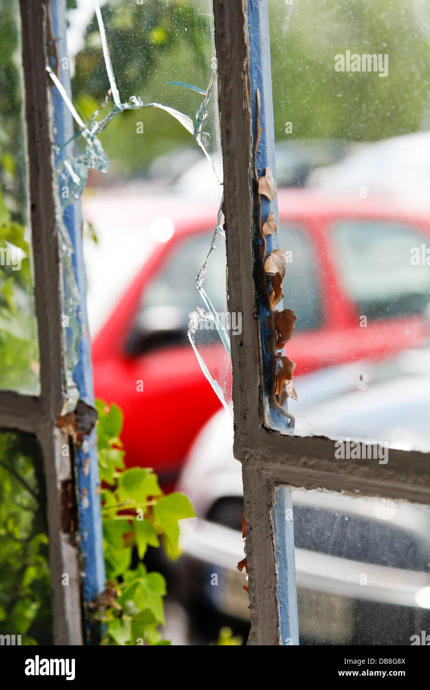 A broken window following a burglary Stock Photo - Alamy