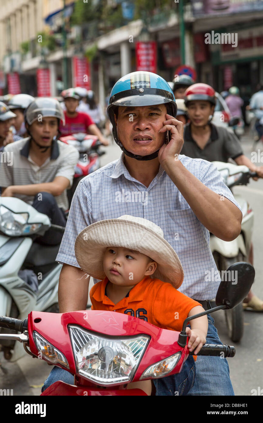 Motorbike traffic on the street in downtown Hanoi, Vietnam, Asia Stock ...