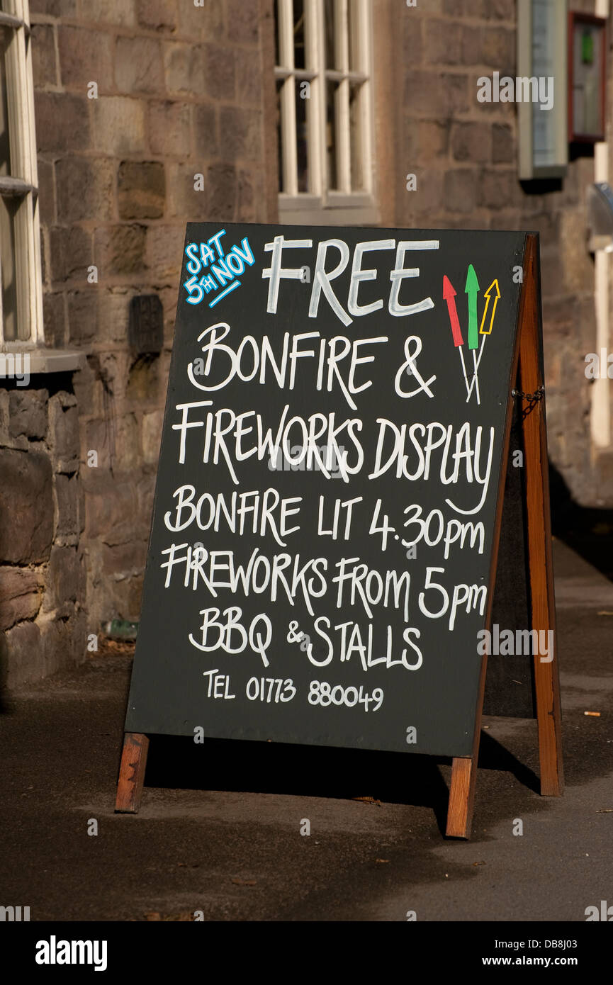Blackboard advertising a bonfire and fireworks display outside a pub in ...