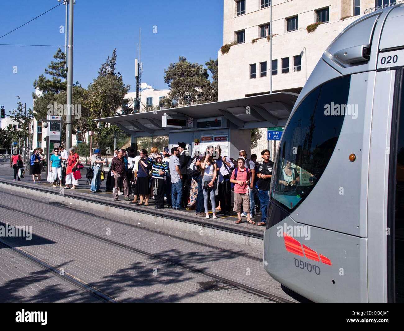 Jerusalem, Israel. 25-July-2013. A tram pulls up to pick up passengers ...
