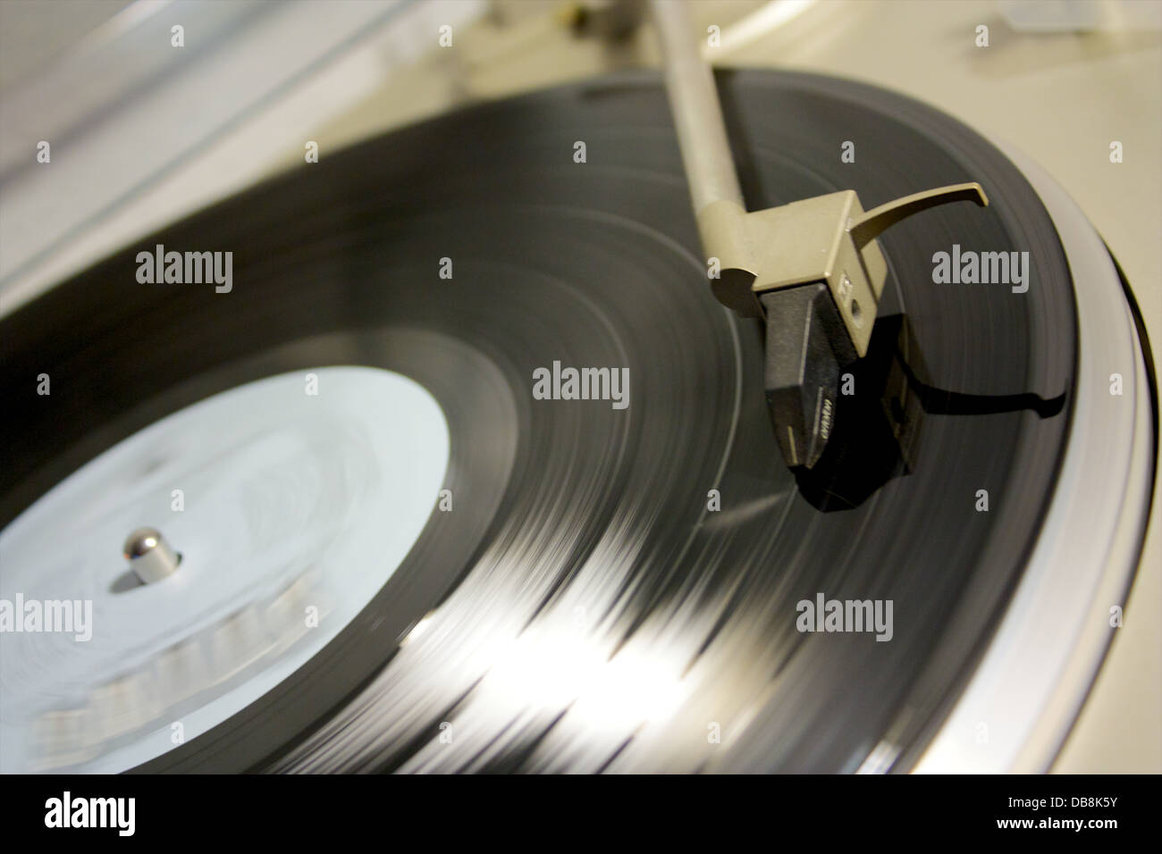 A vinyl record rotating on a turntable Stock Photo - Alamy
