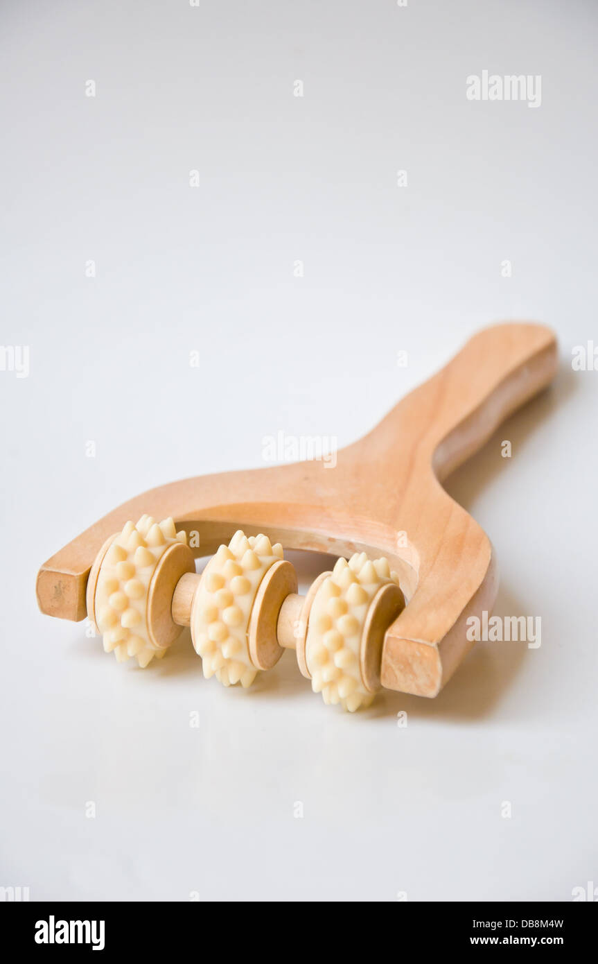 wood tool for massage on white background Stock Photo - Alamy