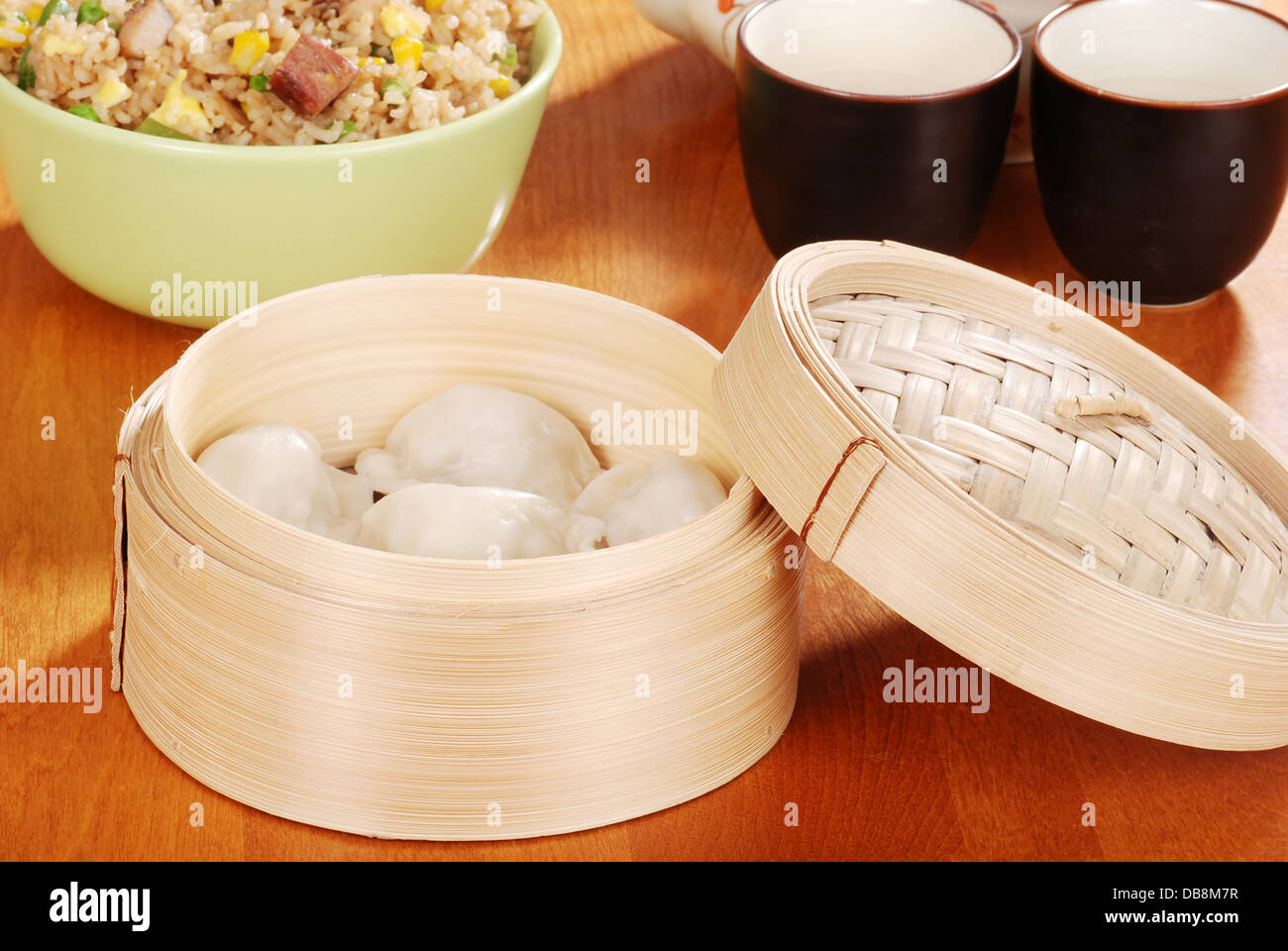 Asian dumpling in bamboo basket Stock Photo - Alamy