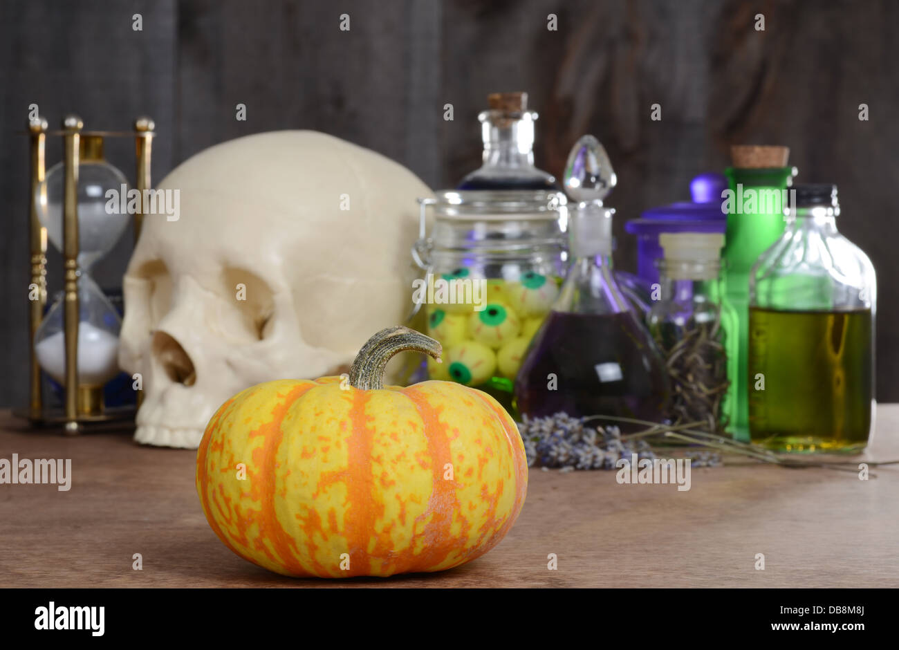 Halloween still life with pumpkin and potions Stock Photo - Alamy
