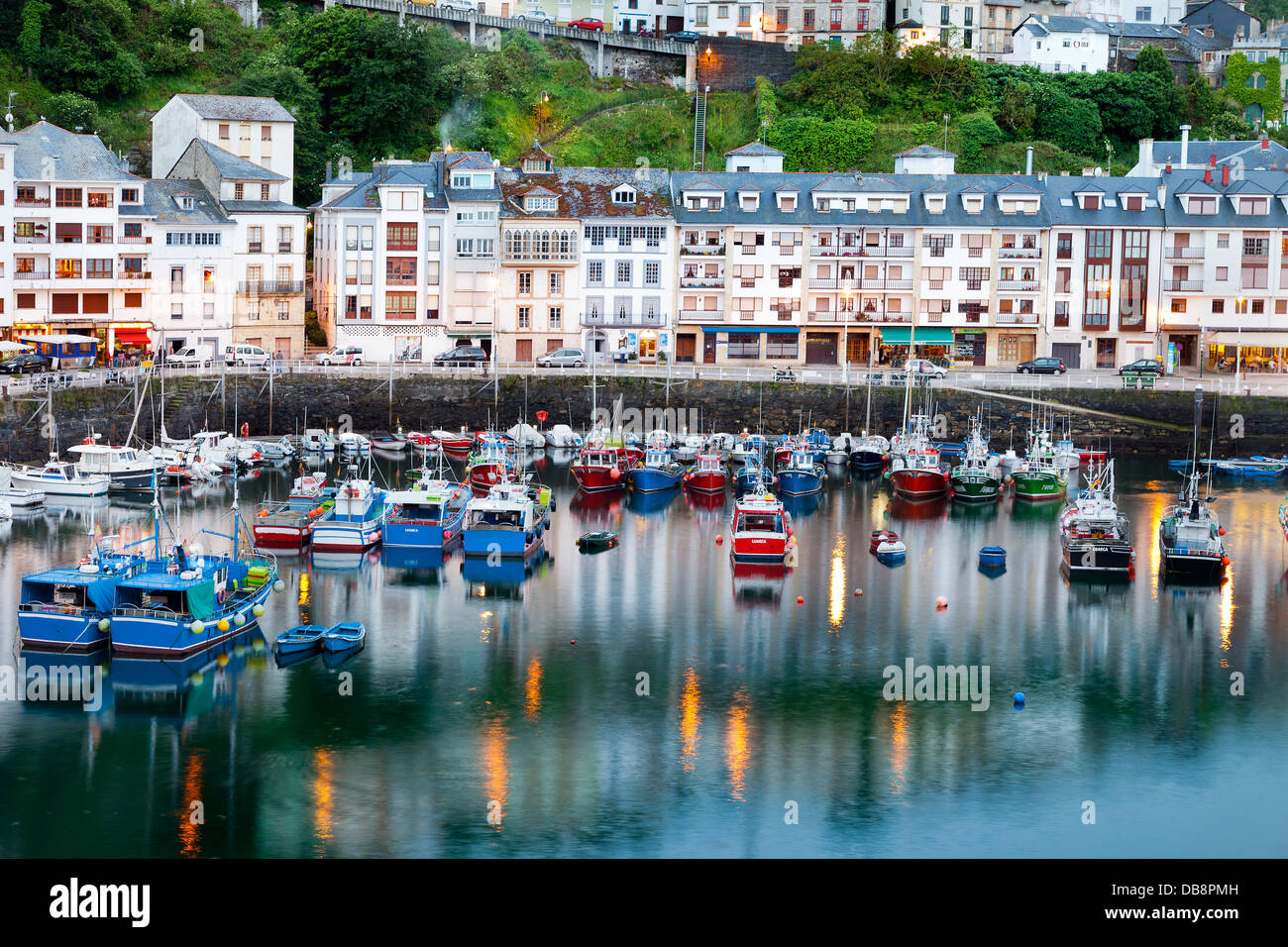 Luarca, Spain- june 24, 2013:night view of the busy and colorful ...