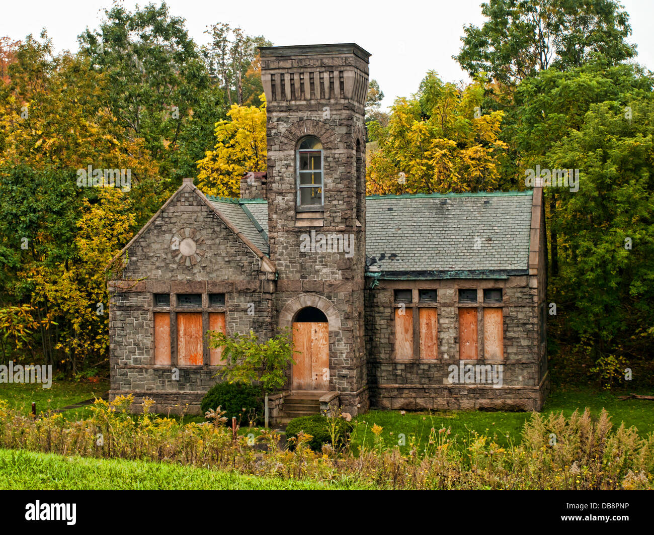boarded- up and abandoned old church in the woods Stock Photo - Alamy