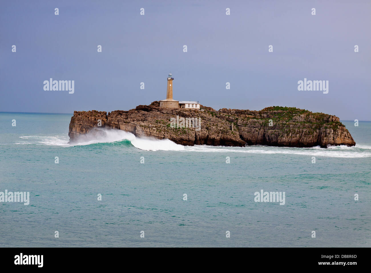 Mouro island lighthouse at entrance of the bay of Santander. Spain ...
