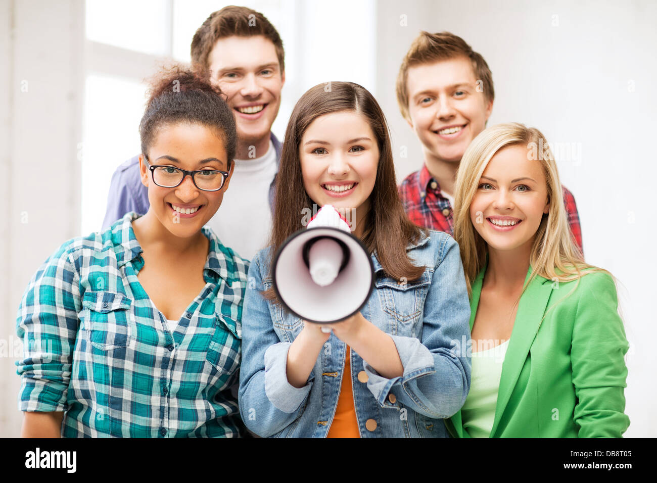 group of students with megaphone at school Stock Photo - Alamy