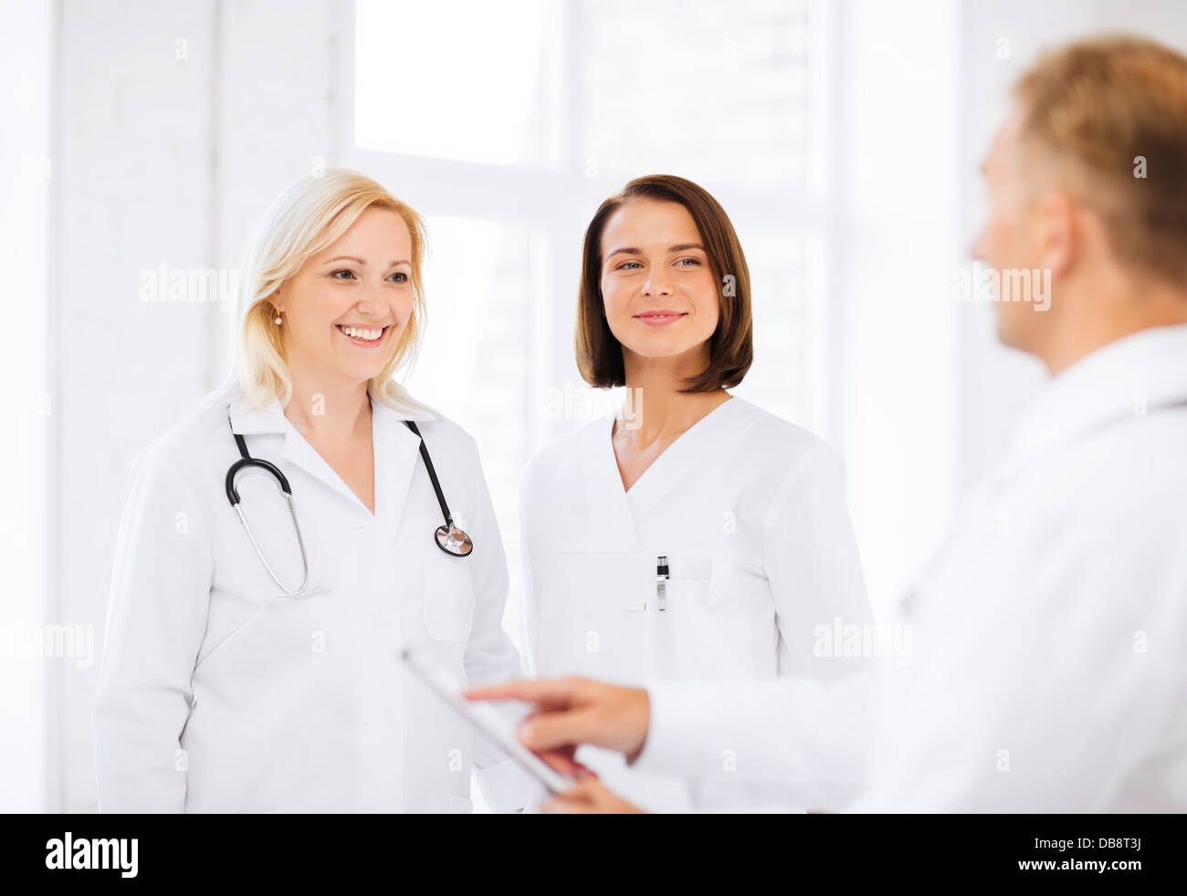 Medical team meeting family hi-res stock photography and images - Alamy