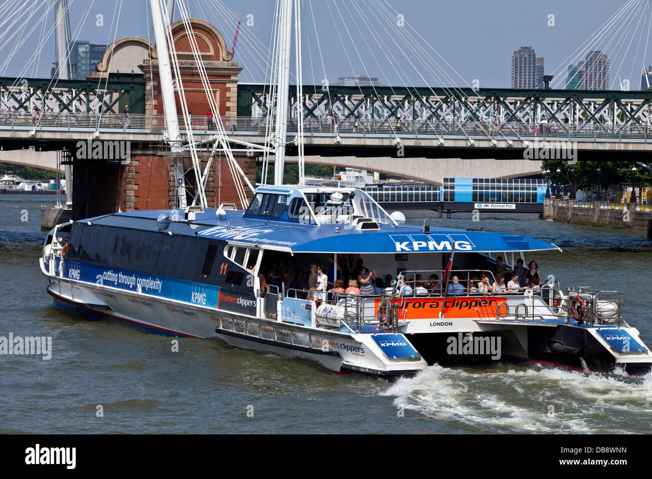 Thames Clipper Passing Under The Golden Jubilee Bridges, London ...