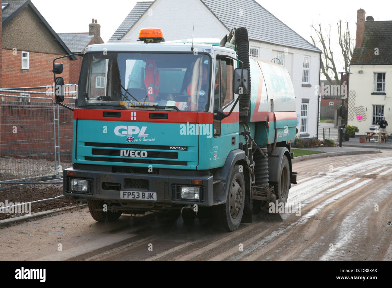 road sweeper cleaning road Stock Photo - Alamy