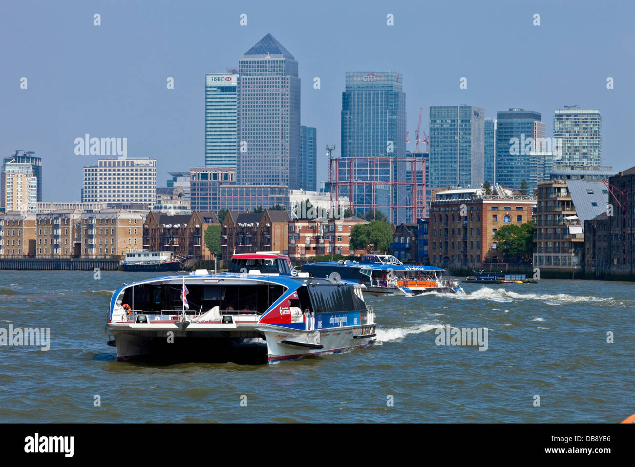Thames Clipper River Bus and Canary Wharf, London, England Stock Photo ...