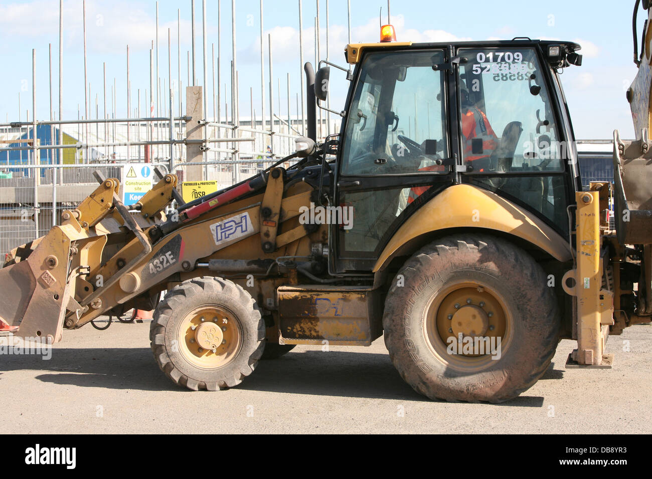 an excavator on a building site Stock Photo - Alamy