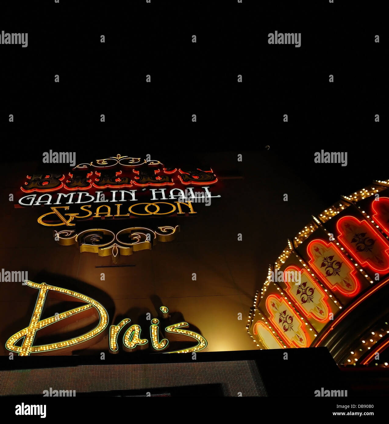 Night portrait, to side of the entrance marquee, yellow Drai's sign ...