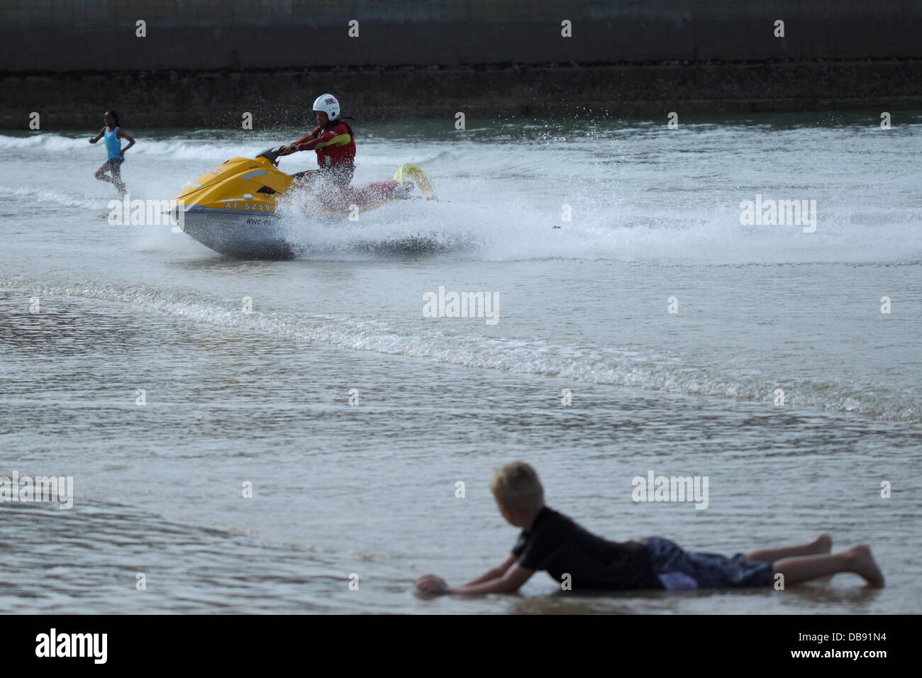 NEWQUAY,CORNWALL, ENGLAND - JULY 25: The Royal National Lifeboat ...