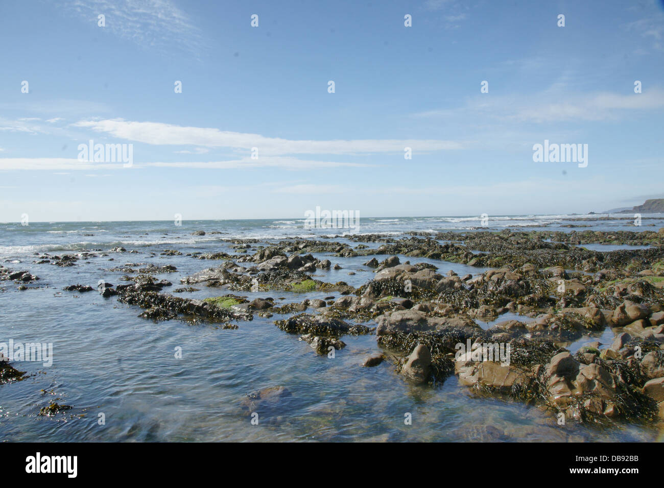 rocky sea edge: Blue sky and sea Stock Photo - Alamy