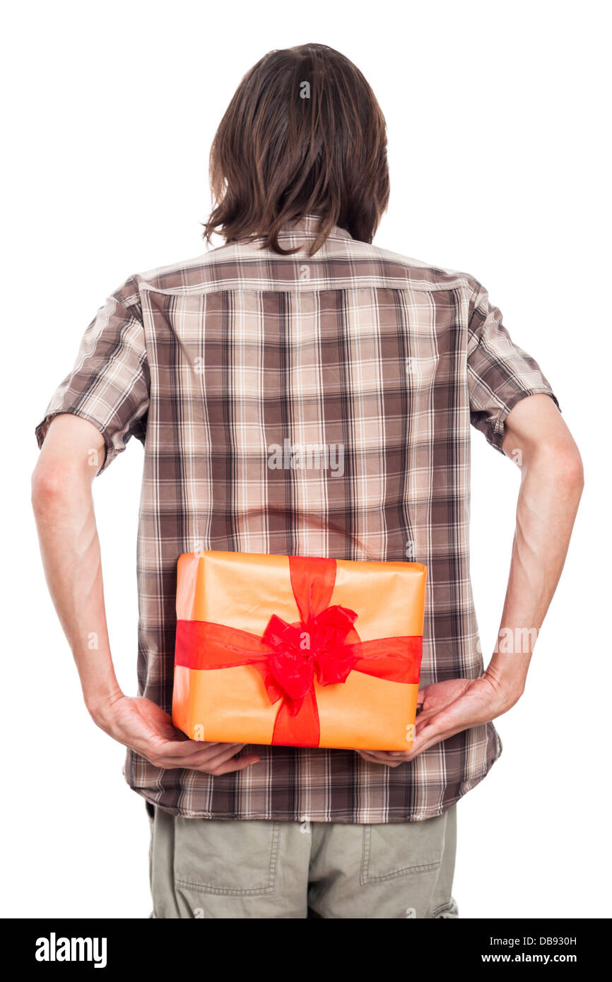 Rear view of a man holding orange gift box, isolated on white ...