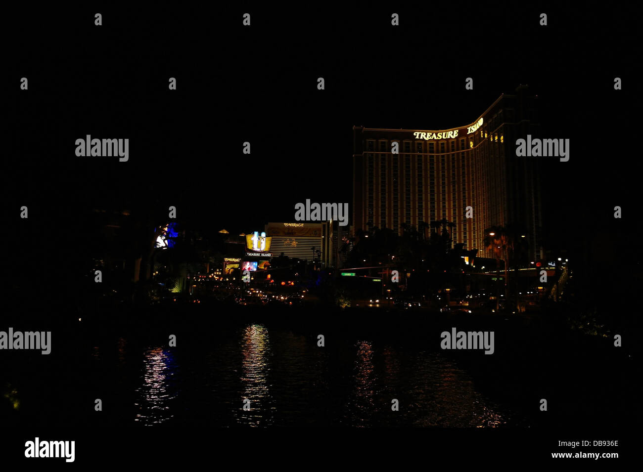 Night view electric lights reflecting waters Wynn Resort Lake, towards ...