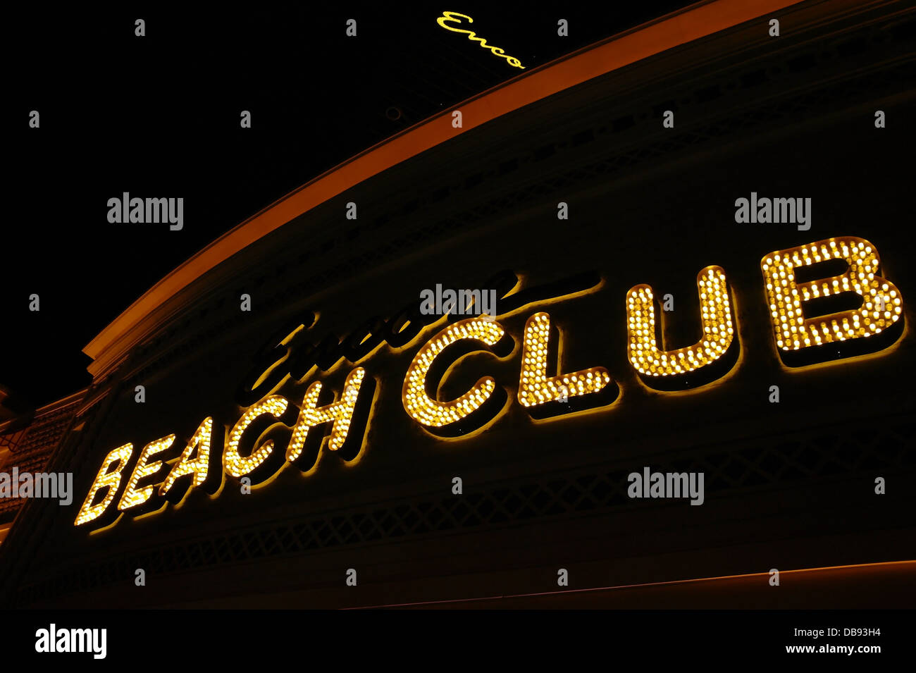 Oblique night view yellow neon 'Encore Beach Club', building facade ...