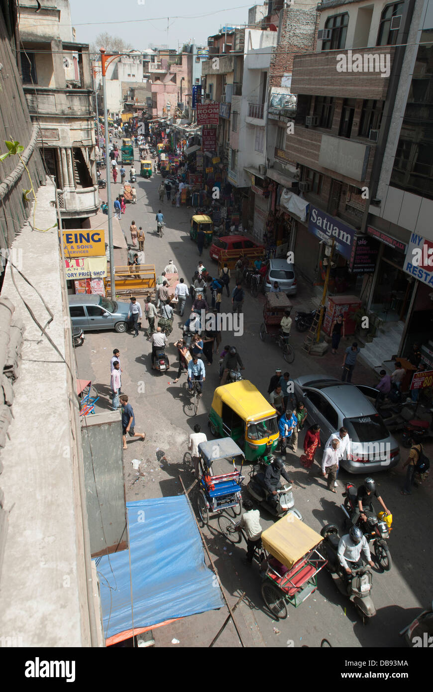 Main Bazaar, Paharganj, Delhi, India. People walk in the Main Bazzar in ...